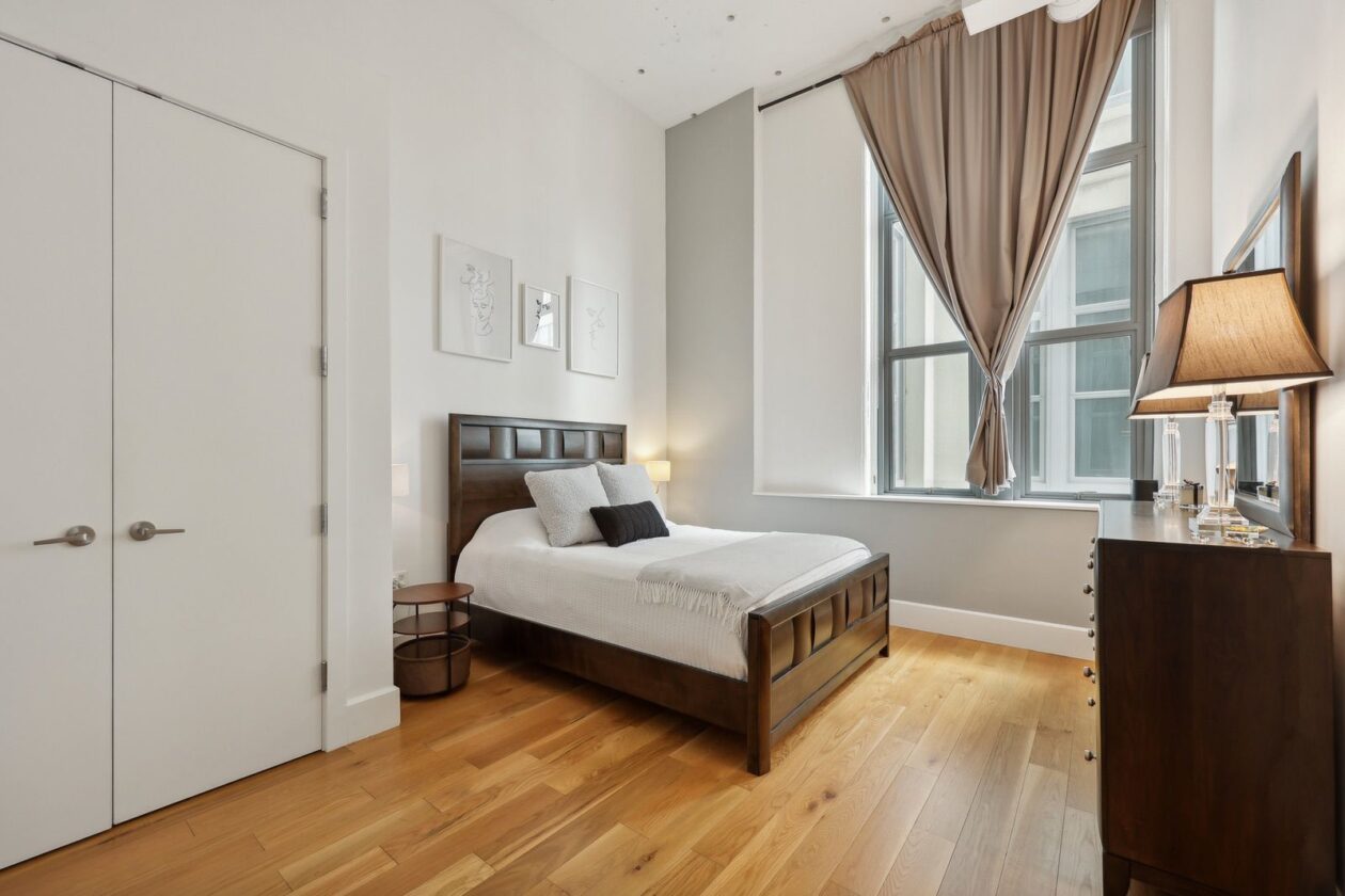 This Stylish Jersey City Loft Features a Flexible Layout and 14-Foot ...